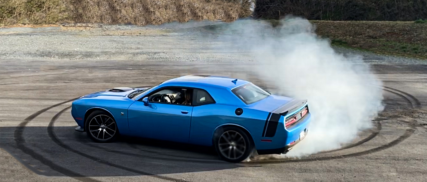 National Police Week: Young racer delivers donuts in a Dodge Challenger ...
